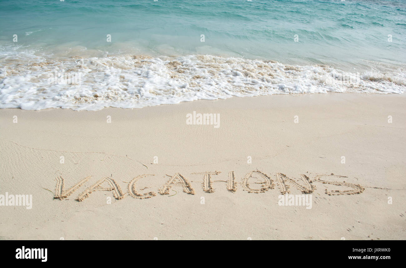 Word Vacation on beach - concept travel background Stock Photo - Alamy
