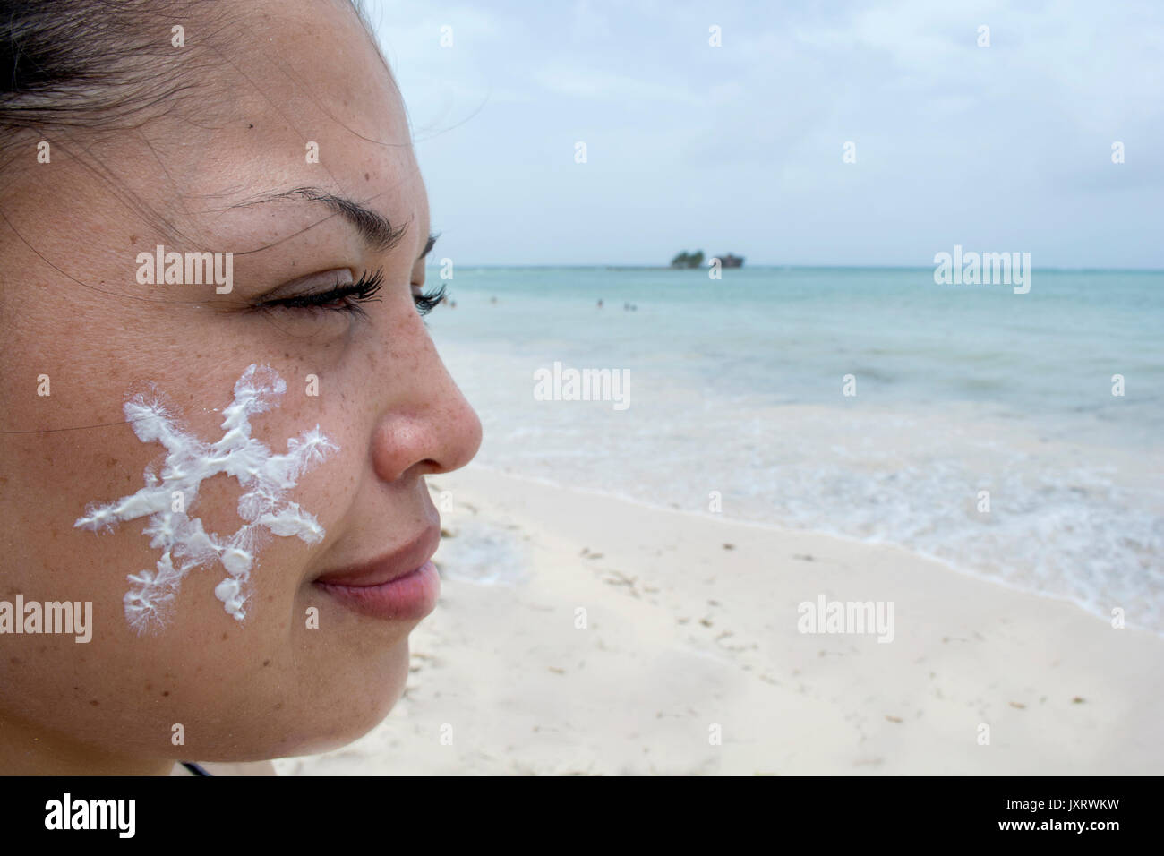 Lady sun cream face hi-res stock photography and images - Alamy