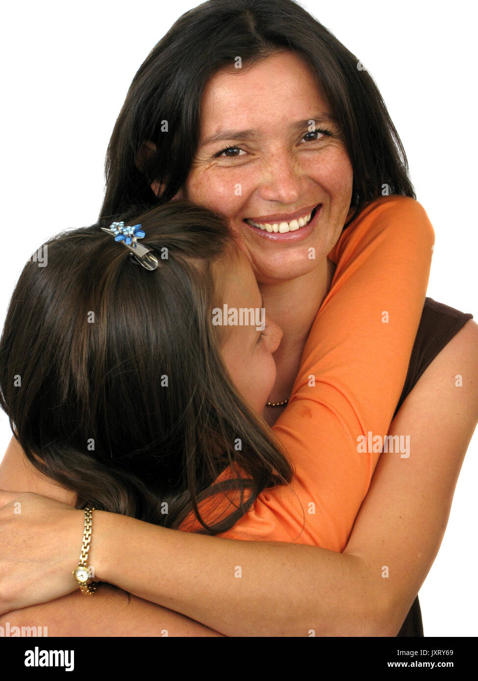 Mother and daughter giving eachother a bedtime hug Stock Photo - Alamy