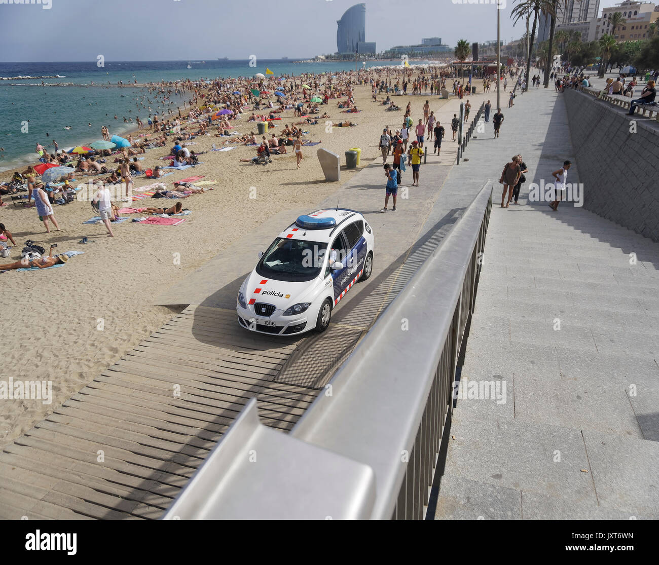 Barcelona, Spain Police car on Barceloneta beach. Police car by the ...