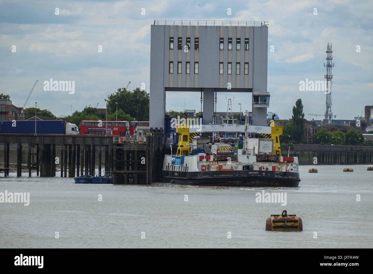 London, UK. 16th Aug, 2017. The Woolwich Ferrys are seen on a fine and ...