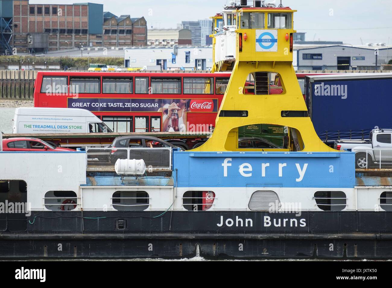 London, UK. 16th Aug, 2017. The Woolwich Ferrys are seen on a fine and ...