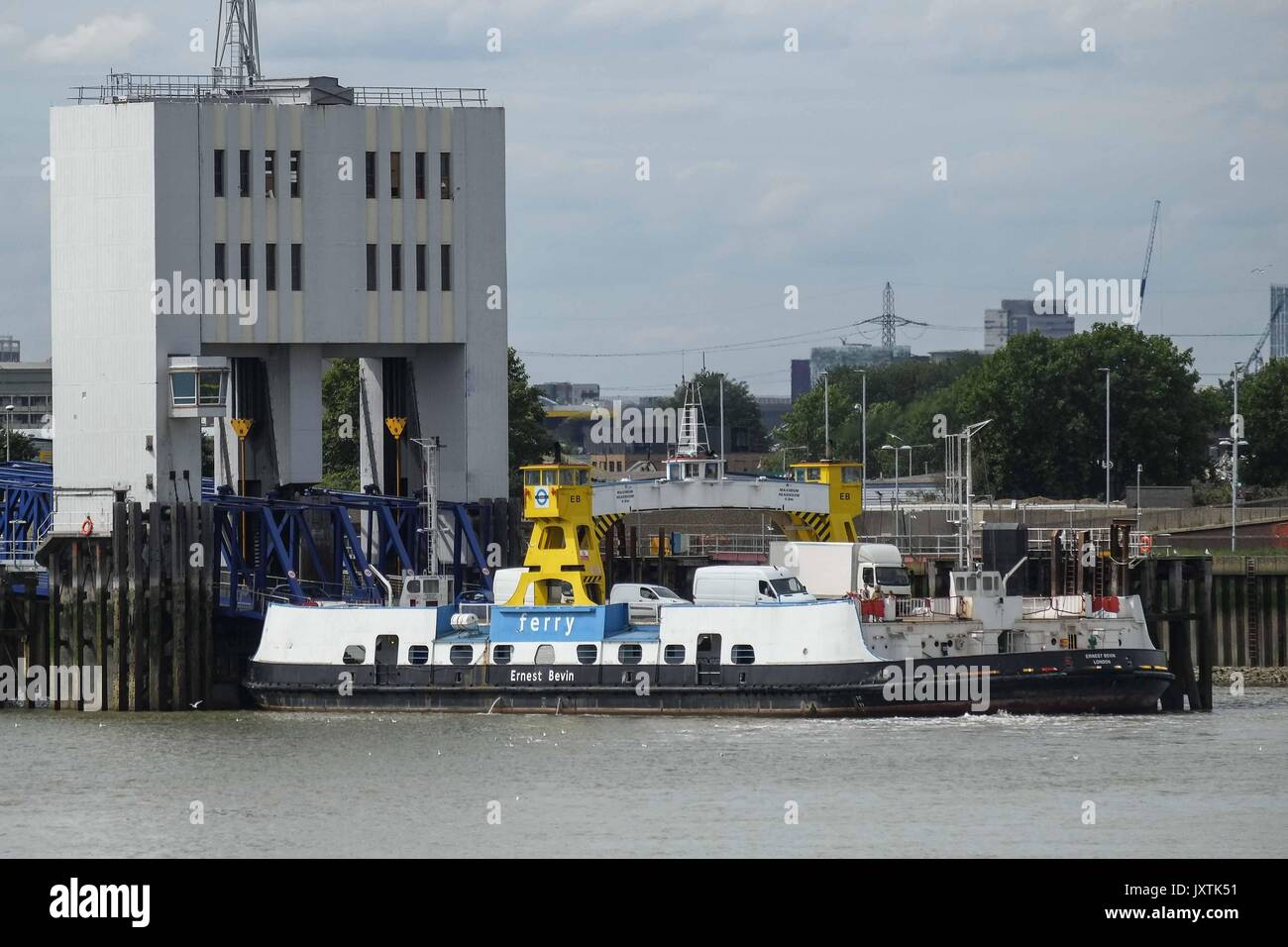 London, UK. 16th Aug, 2017. The Woolwich Ferrys are seen on a fine and ...