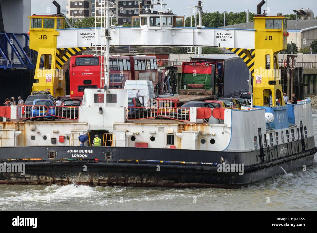 London, UK. 16th Aug, 2017. The Woolwich Ferrys are seen on a fine and ...