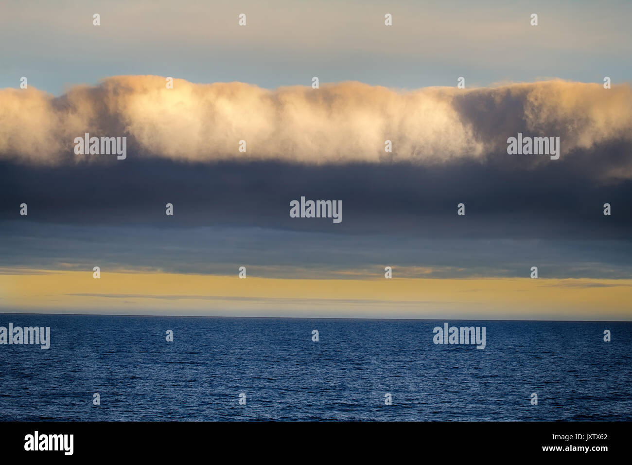 Front of cloud system (weather barrier). Dense vertical clouds near the ...