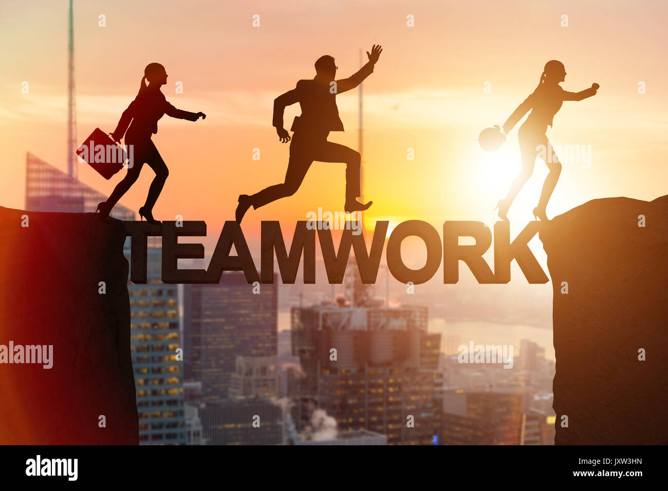 Teamwork concept with business people crossing bridge Stock Photo - Alamy