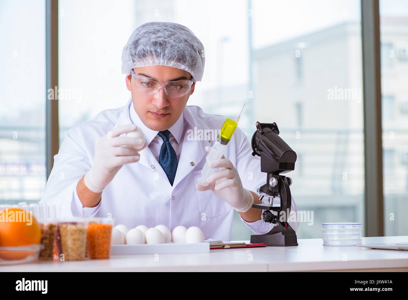 Nutrition expert testing food products in lab Stock Photo - Alamy