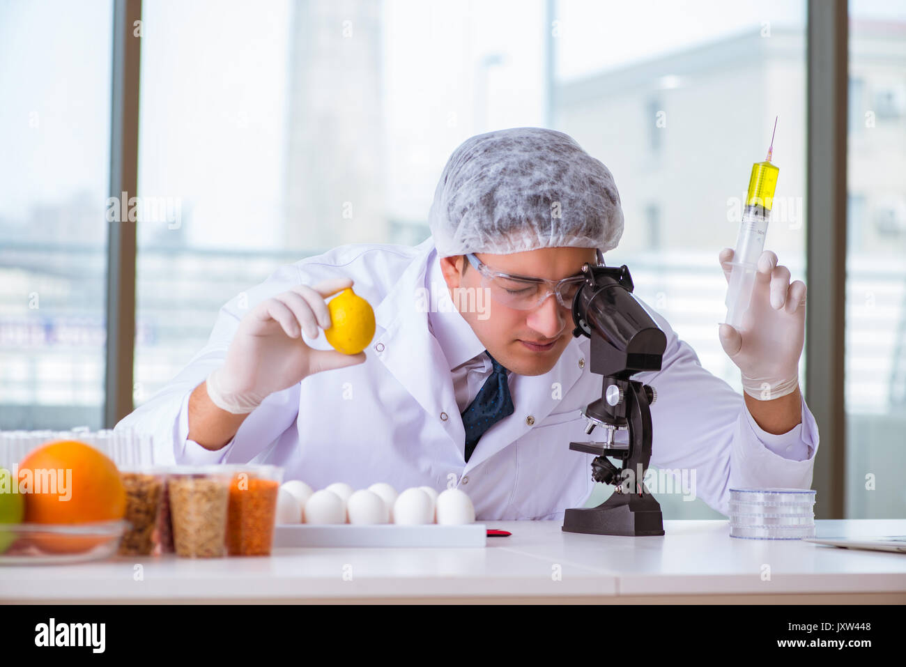Nutrition expert testing food products in lab Stock Photo - Alamy