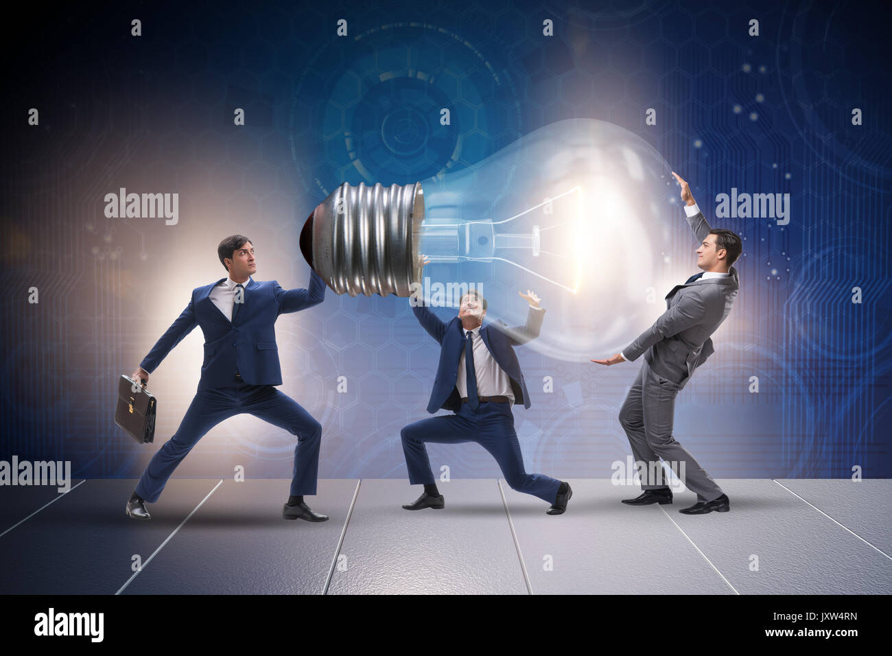 Businessmen in bright idea concept Stock Photo - Alamy