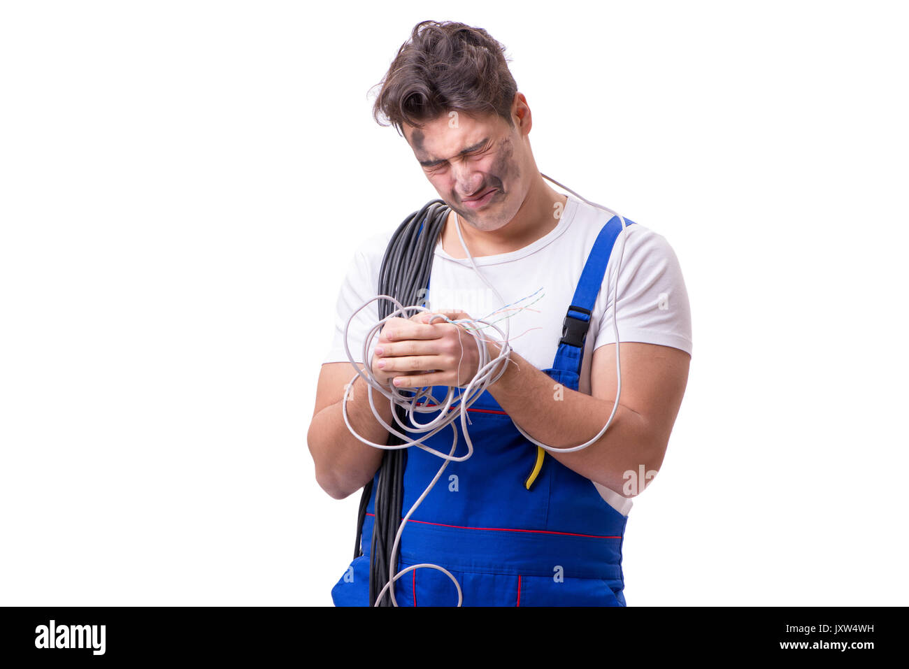 Funny man doing electrical repair Stock Photo - Alamy