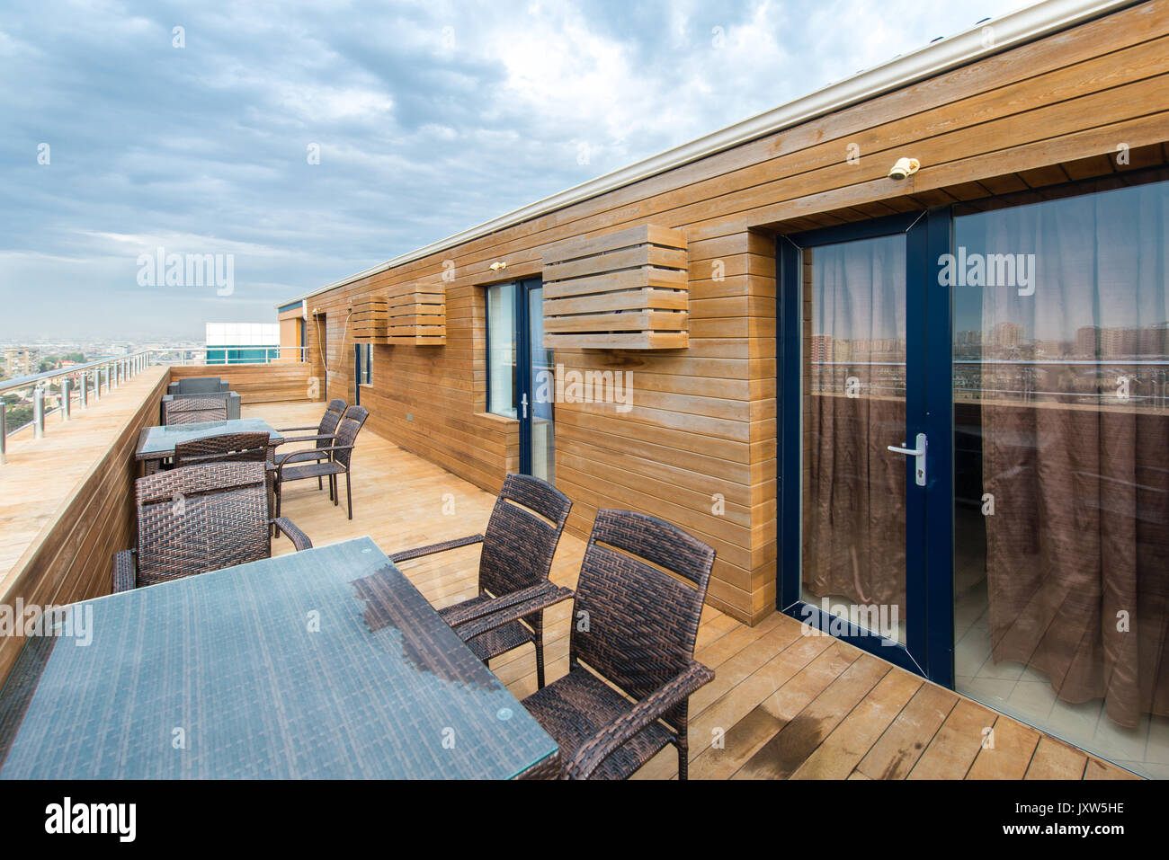 Terrace cafe on top floor Stock Photo - Alamy