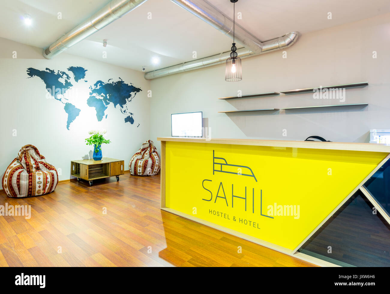 Hotel reception of hostel dormitory Stock Photo - Alamy