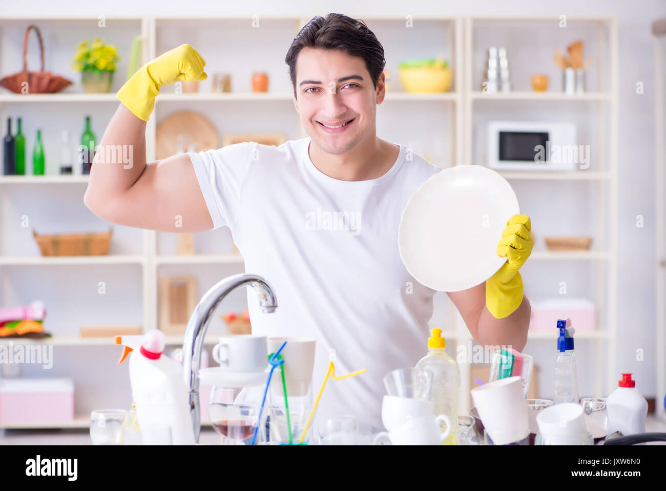 Husband washing dishes hi-res stock photography and images - Alamy