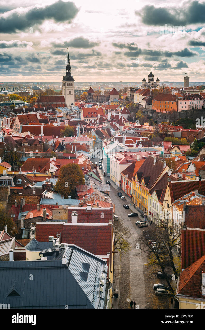 Tallinn city from above view against sun and cloudscape. Sunlit old ...