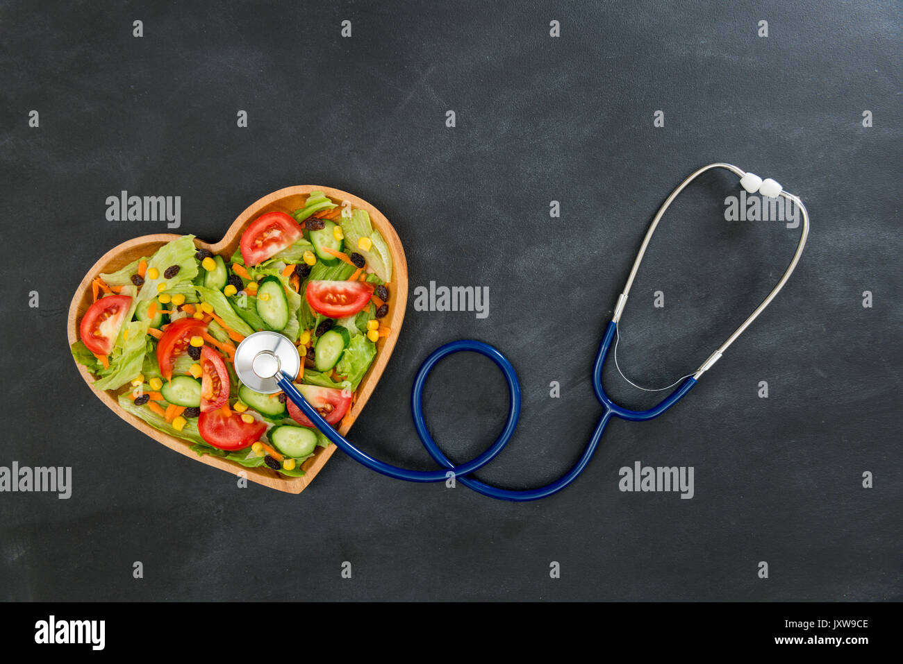 medical device stethoscope touching fresh healthy food vegetable in ...