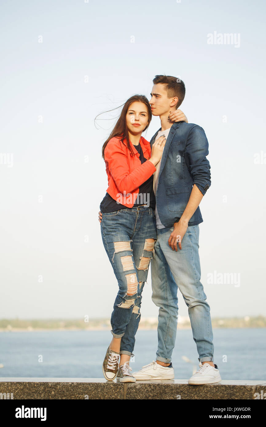 First love. Romantic hugs. Teenagers on a date Stock Photo - Alamy