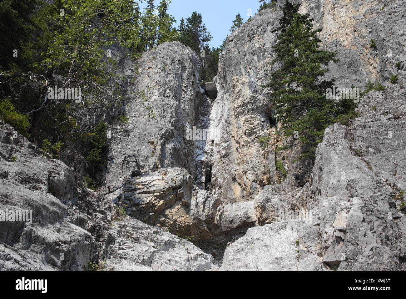 Hiking the second canyon on Grotto Mountain Stock Photo - Alamy