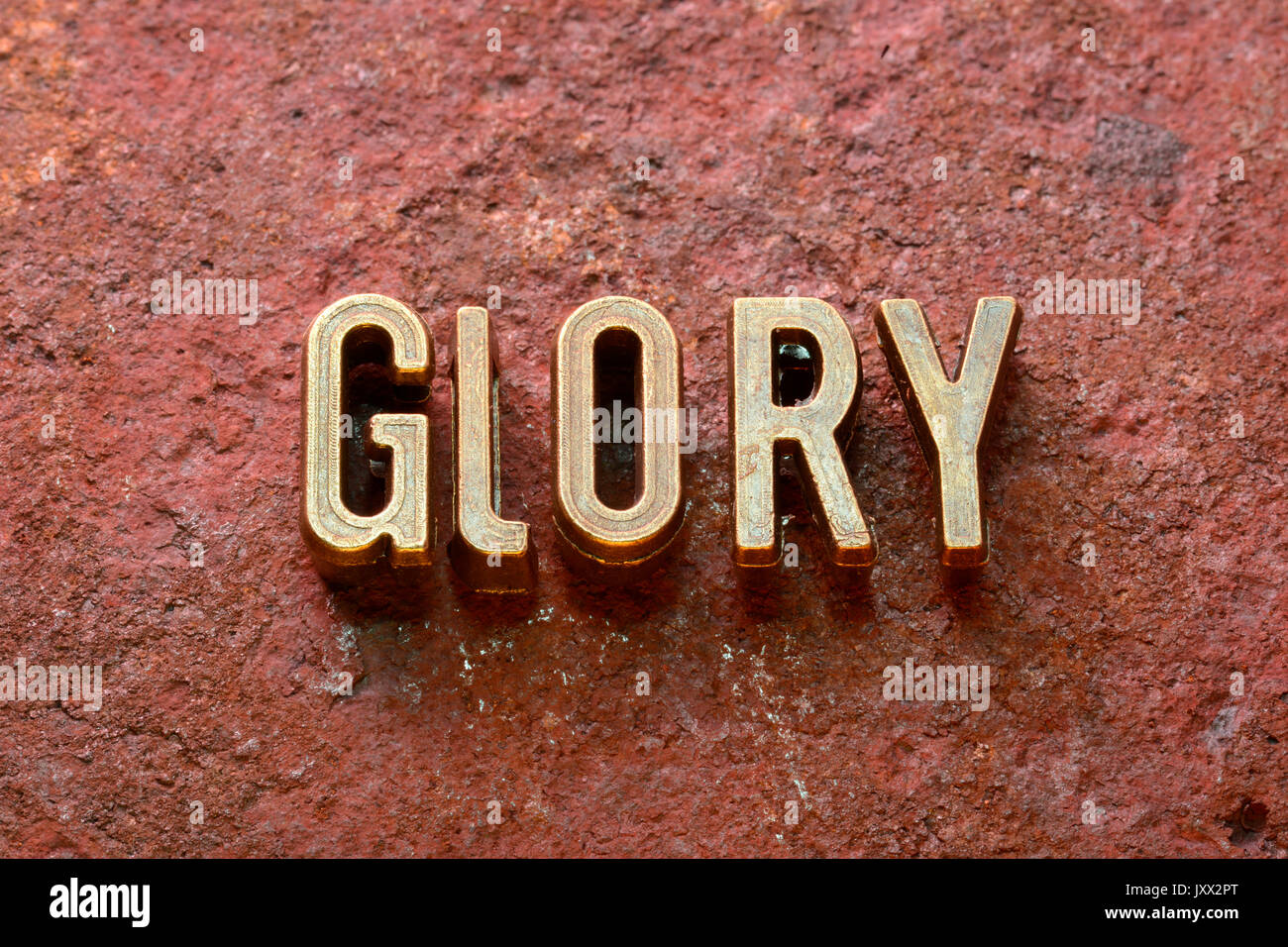glory word made from metallic letters on red rusty surface Stock Photo ...
