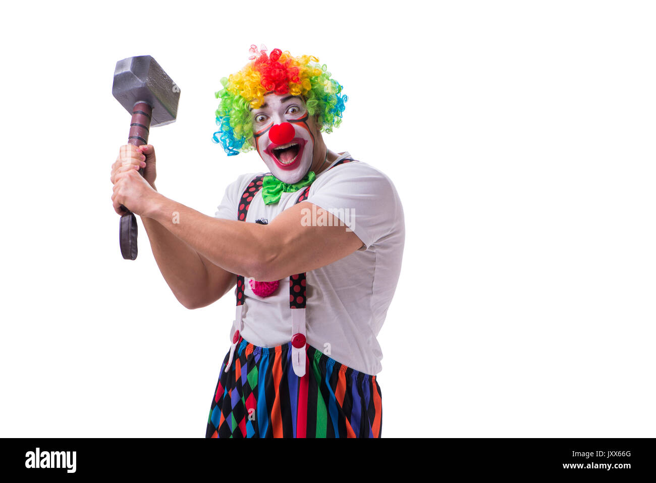 Funny clown with a hammer isolated on white background Stock Photo - Alamy