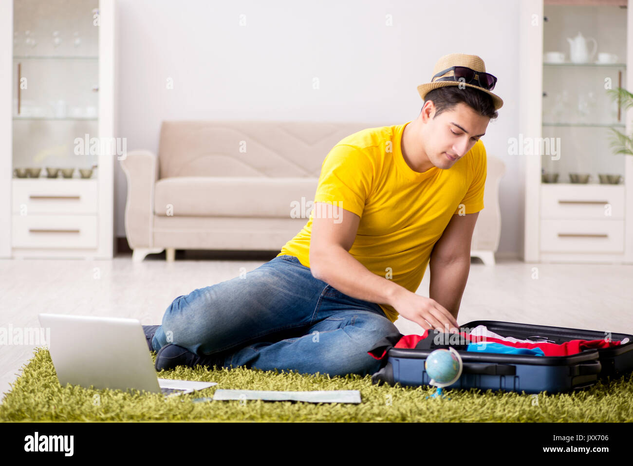 Man planning his vacation trip with map Stock Photo - Alamy