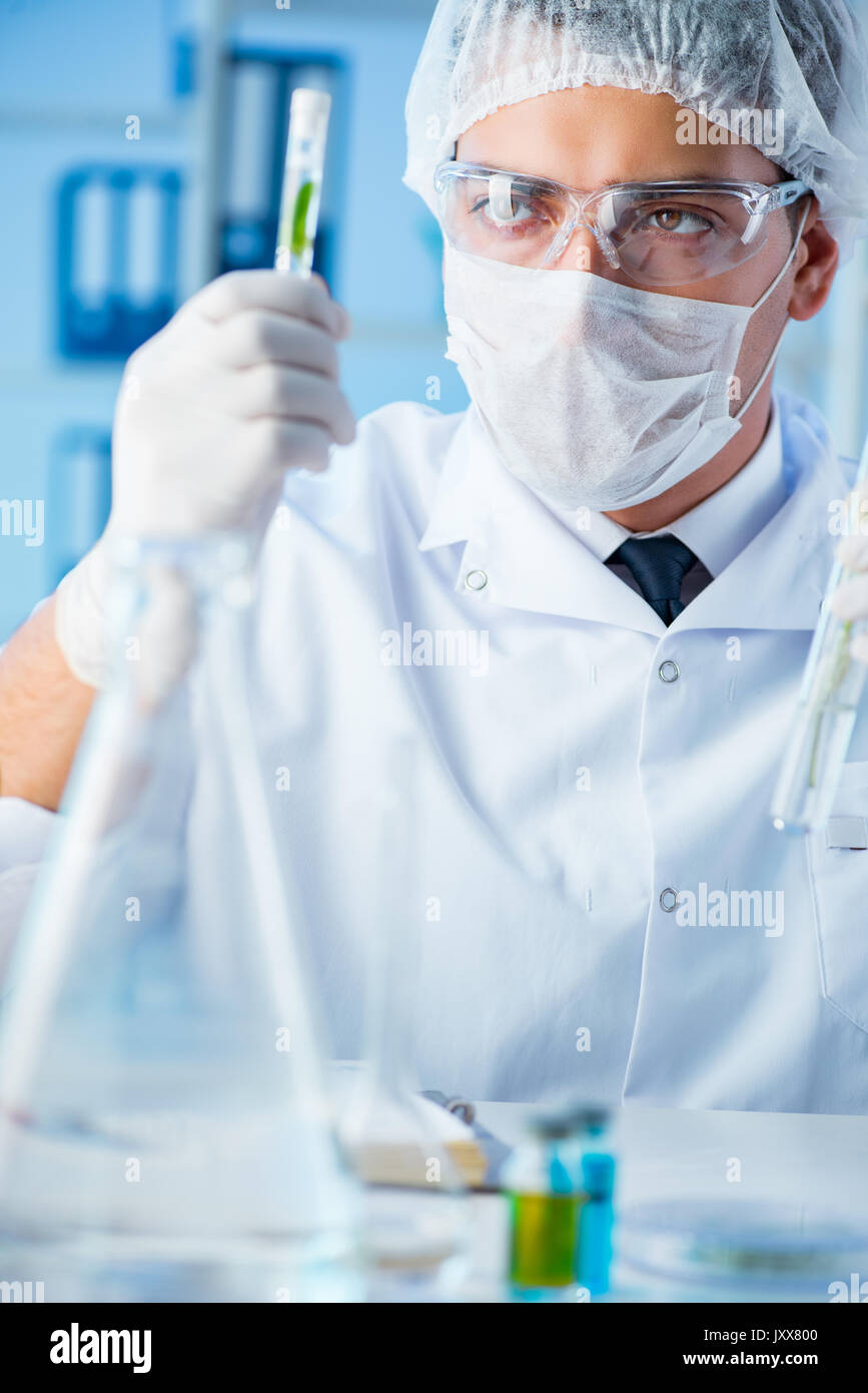 Biotechnology concept with scientist in lab Stock Photo - Alamy