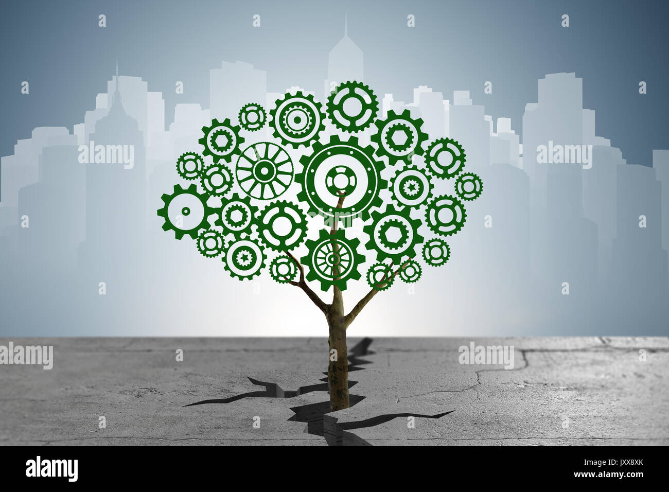 Cogwheel tree growing through soil crack Stock Photo - Alamy