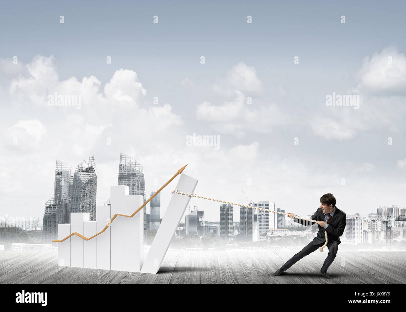 Man pulling with effort big pulling rope graph, as a symbol of ...