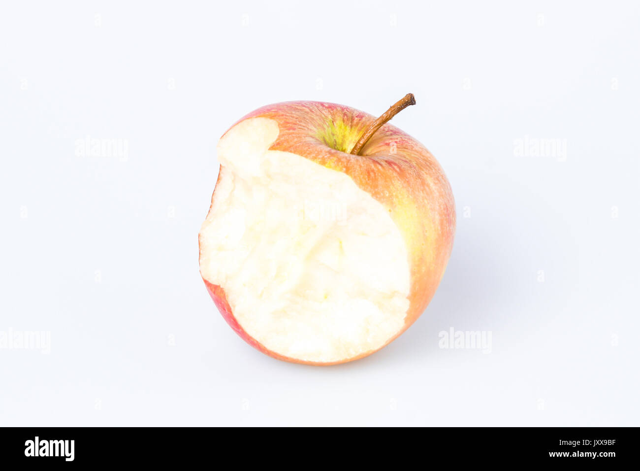 Organic bitten apple isolated on white background Stock Photo - Alamy