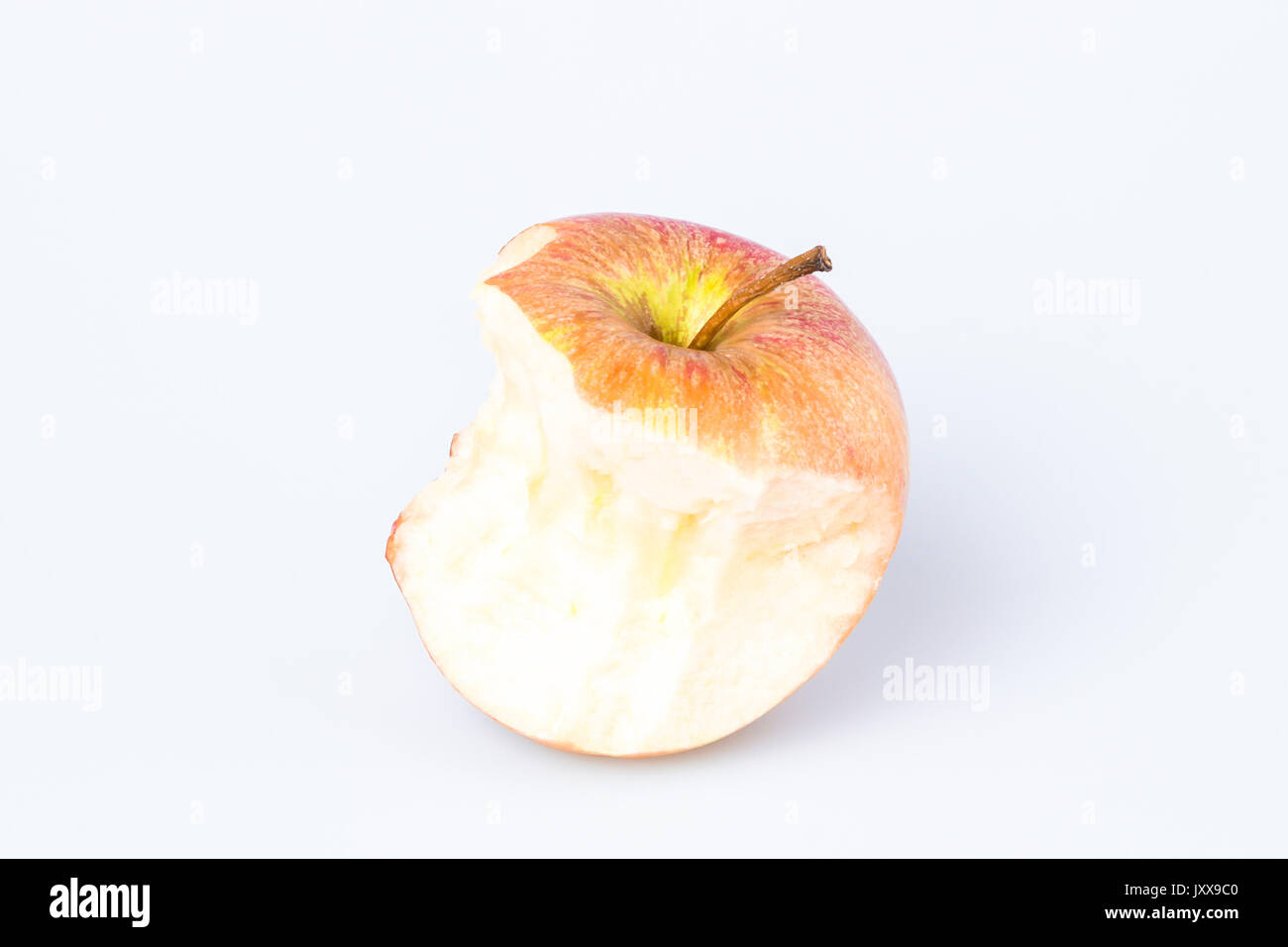 Organic bitten apple isolated on white background Stock Photo - Alamy