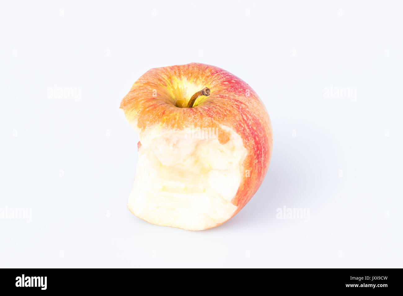 Organic bitten apple isolated on white background Stock Photo - Alamy