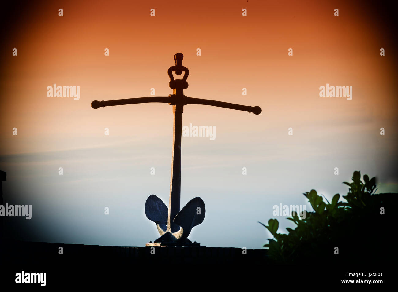 Old rusty ship anchor on a wall Stock Photo - Alamy