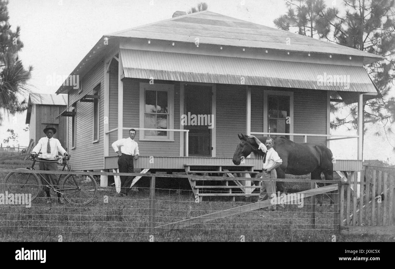 One behind another Black and White Stock Photos & Images - Alamy