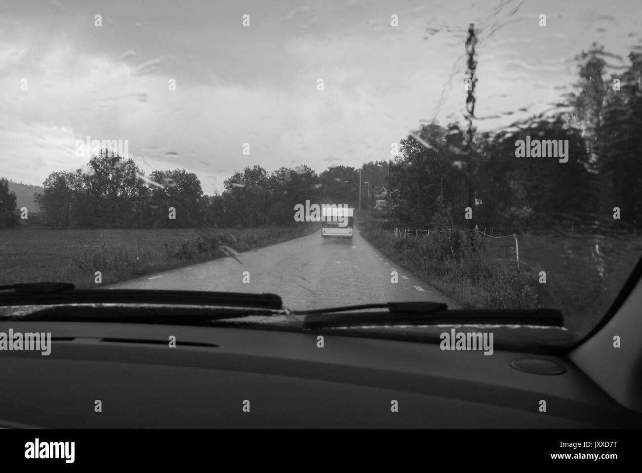 A rainy day outside a car window in blacka and white Stock Photo - Alamy
