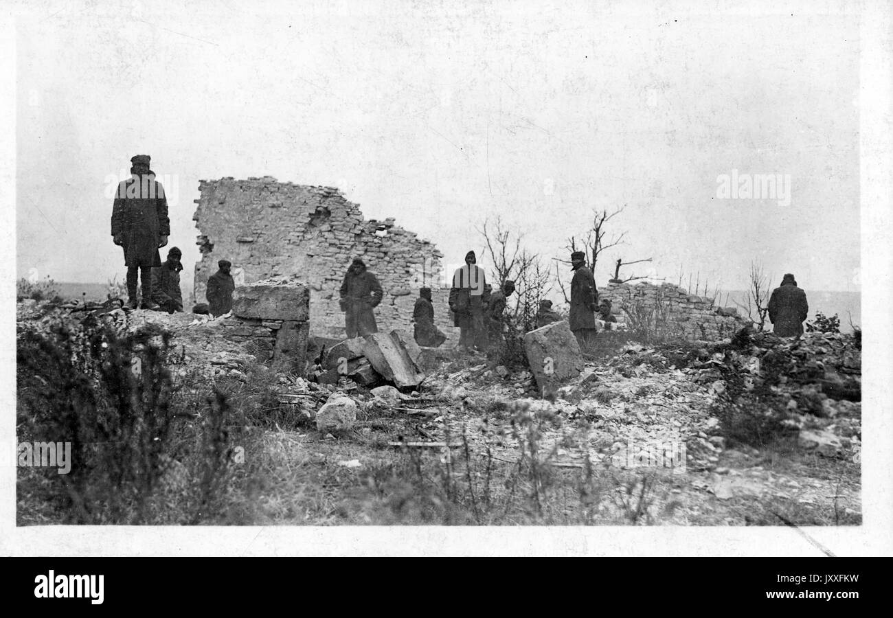 Landscape full portrait of people standing around building ruins ...