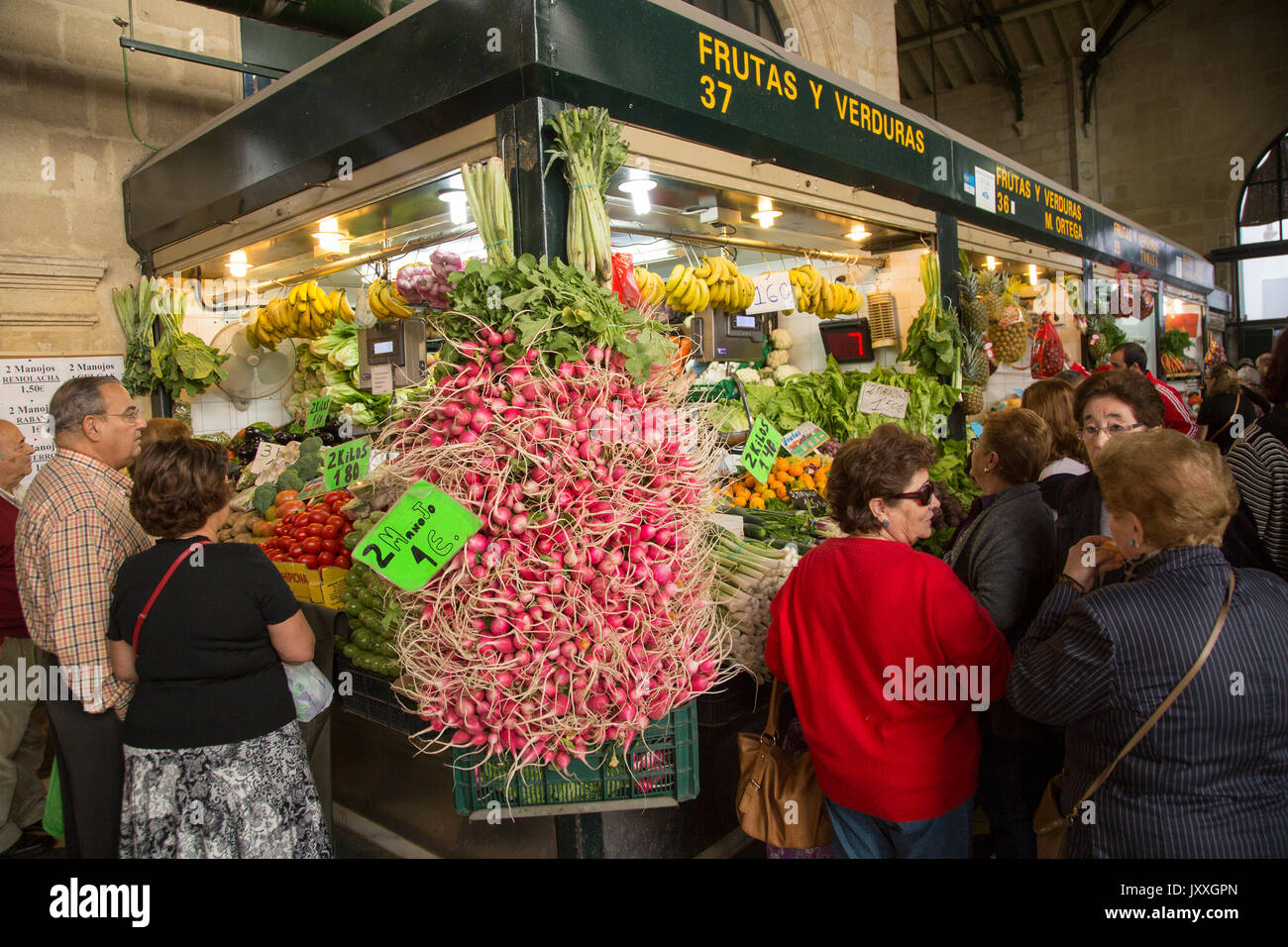 Fresh radishes in large bunch vegetable market stall, Jerez de la ...