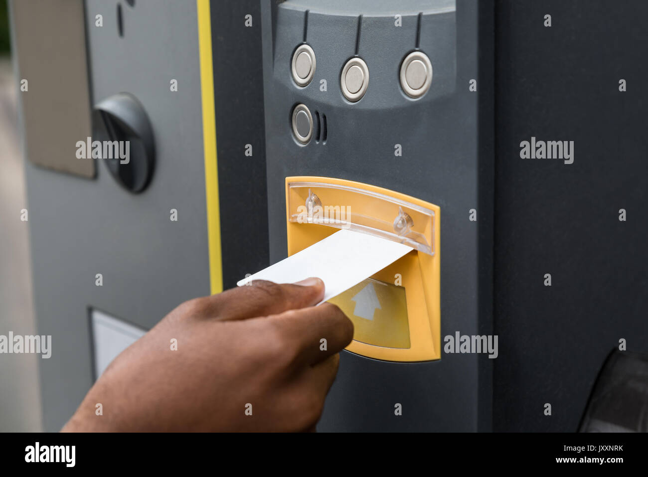 Man and hand and ticket machine hi-res stock photography and images - Alamy