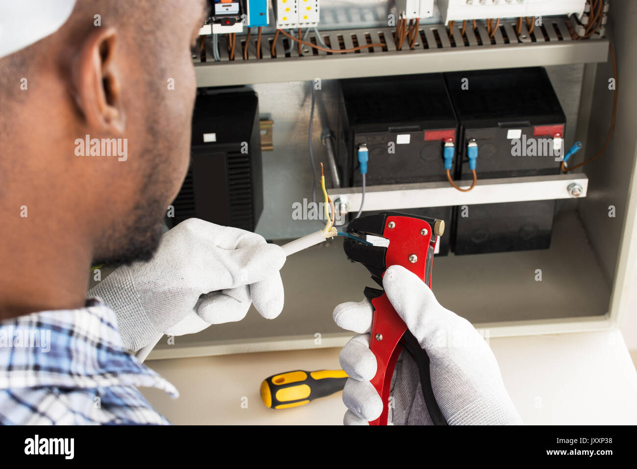 Inspecting fixing electrical wires hi-res stock photography and images ...