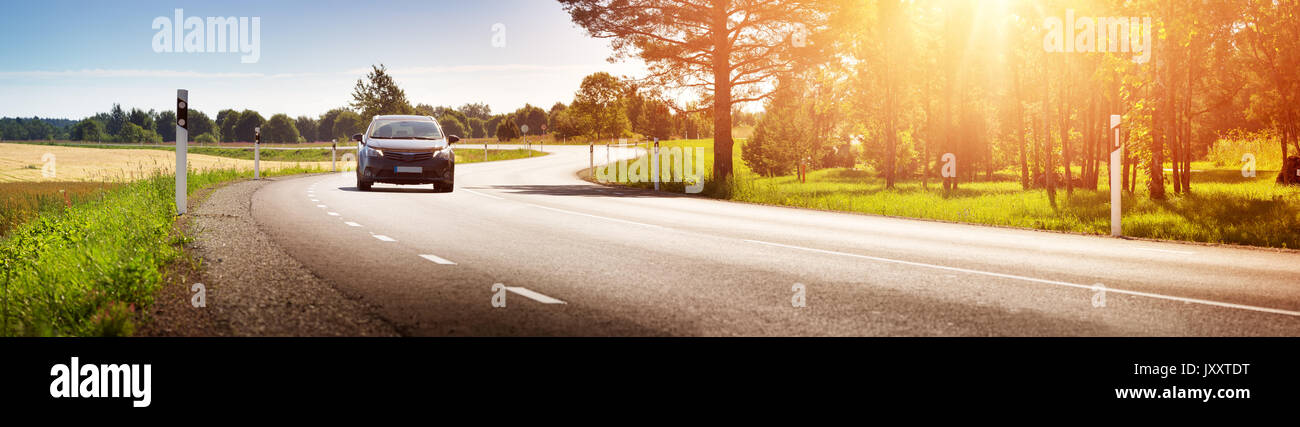 Road panorama on sunny spring evening Stock Photo - Alamy