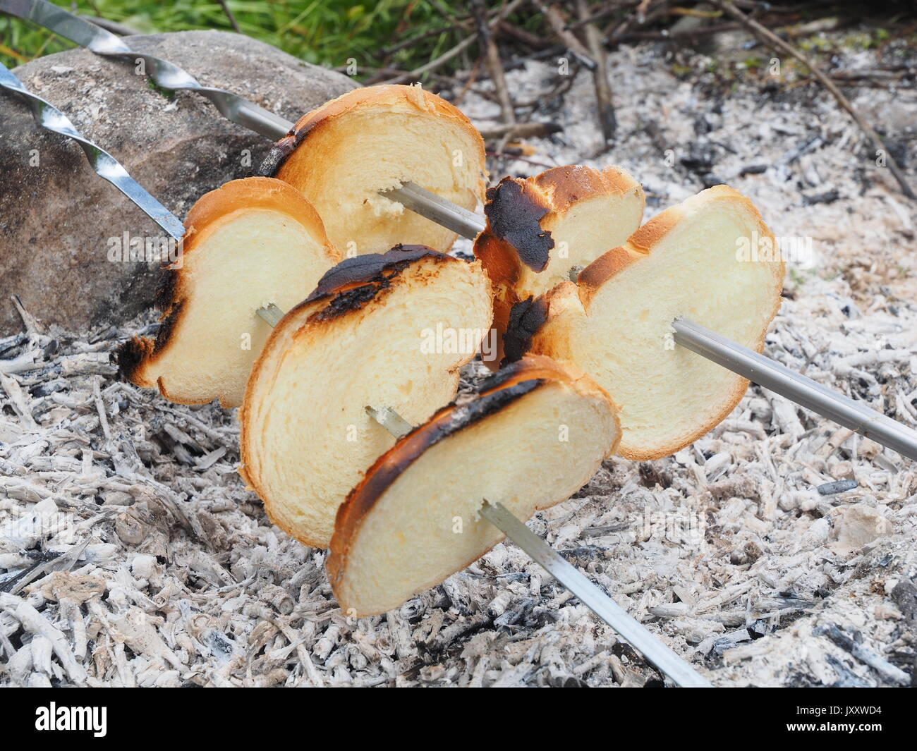 Fried roll on the fire Stock Photo - Alamy