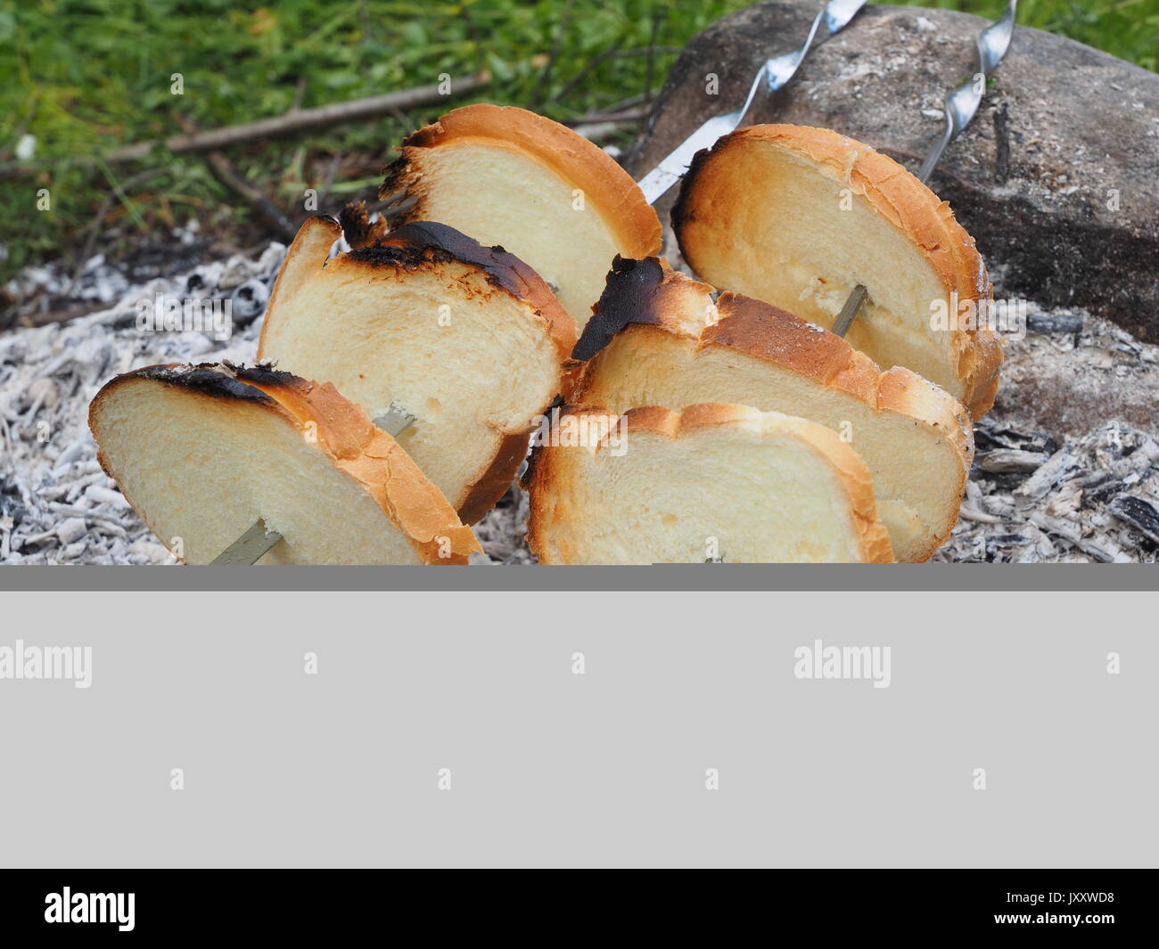 Fried roll on the fire Stock Photo - Alamy