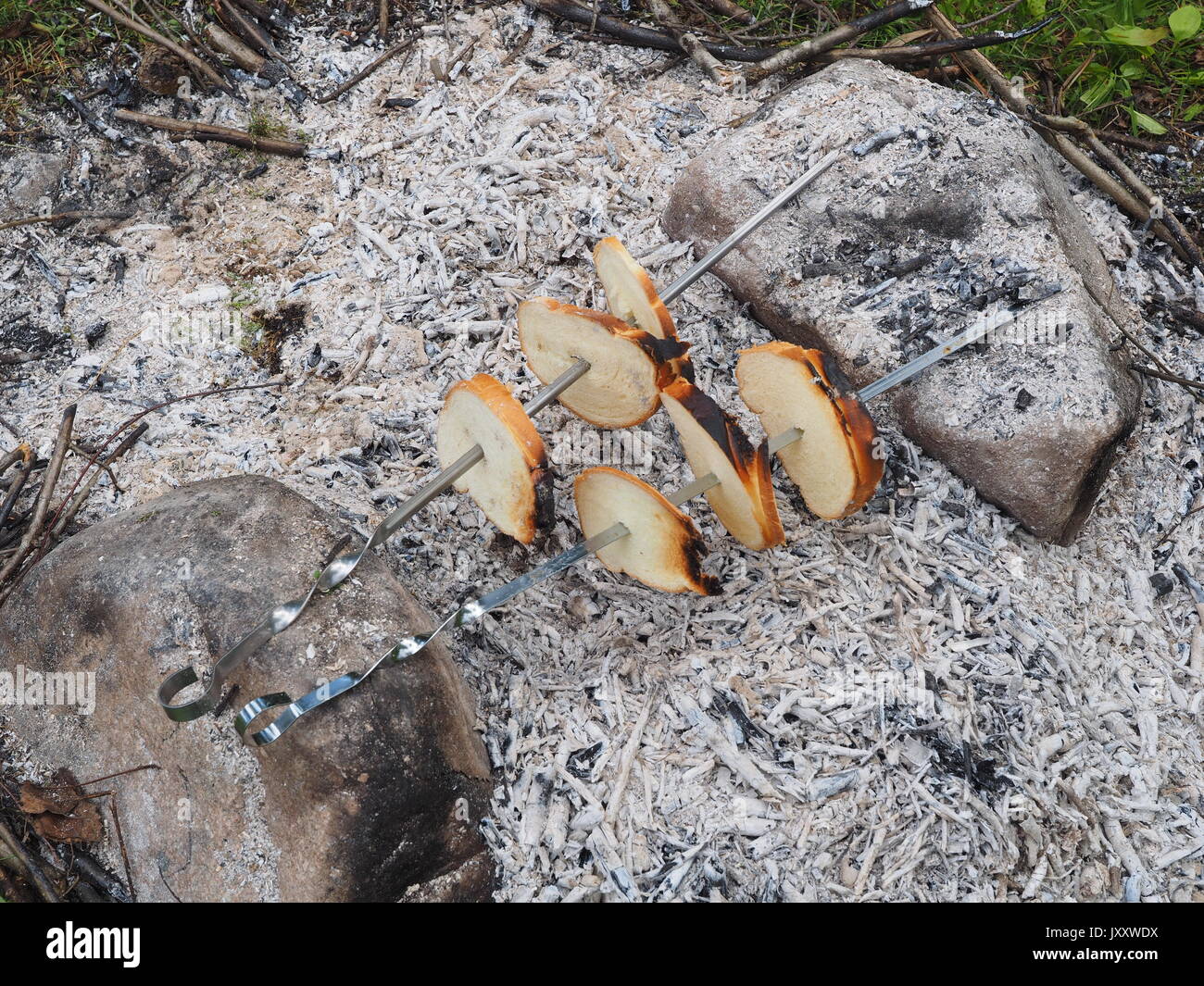 Fried roll on the fire Stock Photo - Alamy
