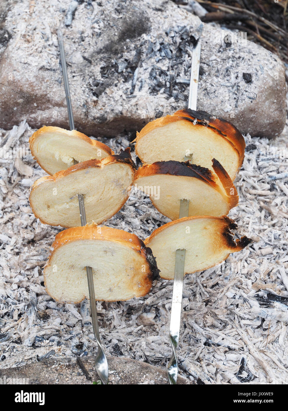 Fried roll on the fire Stock Photo - Alamy
