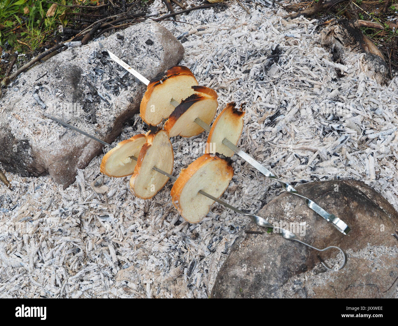 Fried roll on the fire Stock Photo - Alamy