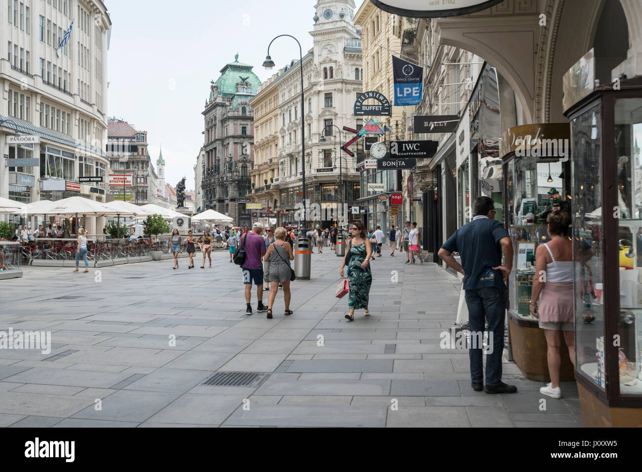 people walk for the shopping in the central Graben street in Vienna ...