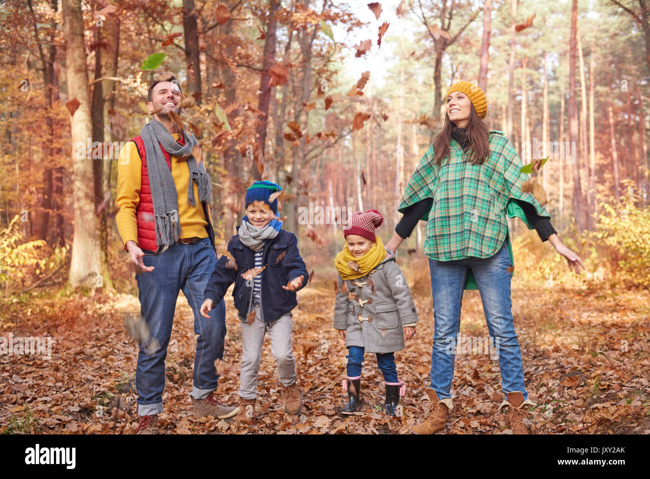 Playing with family in the forest Stock Photo - Alamy