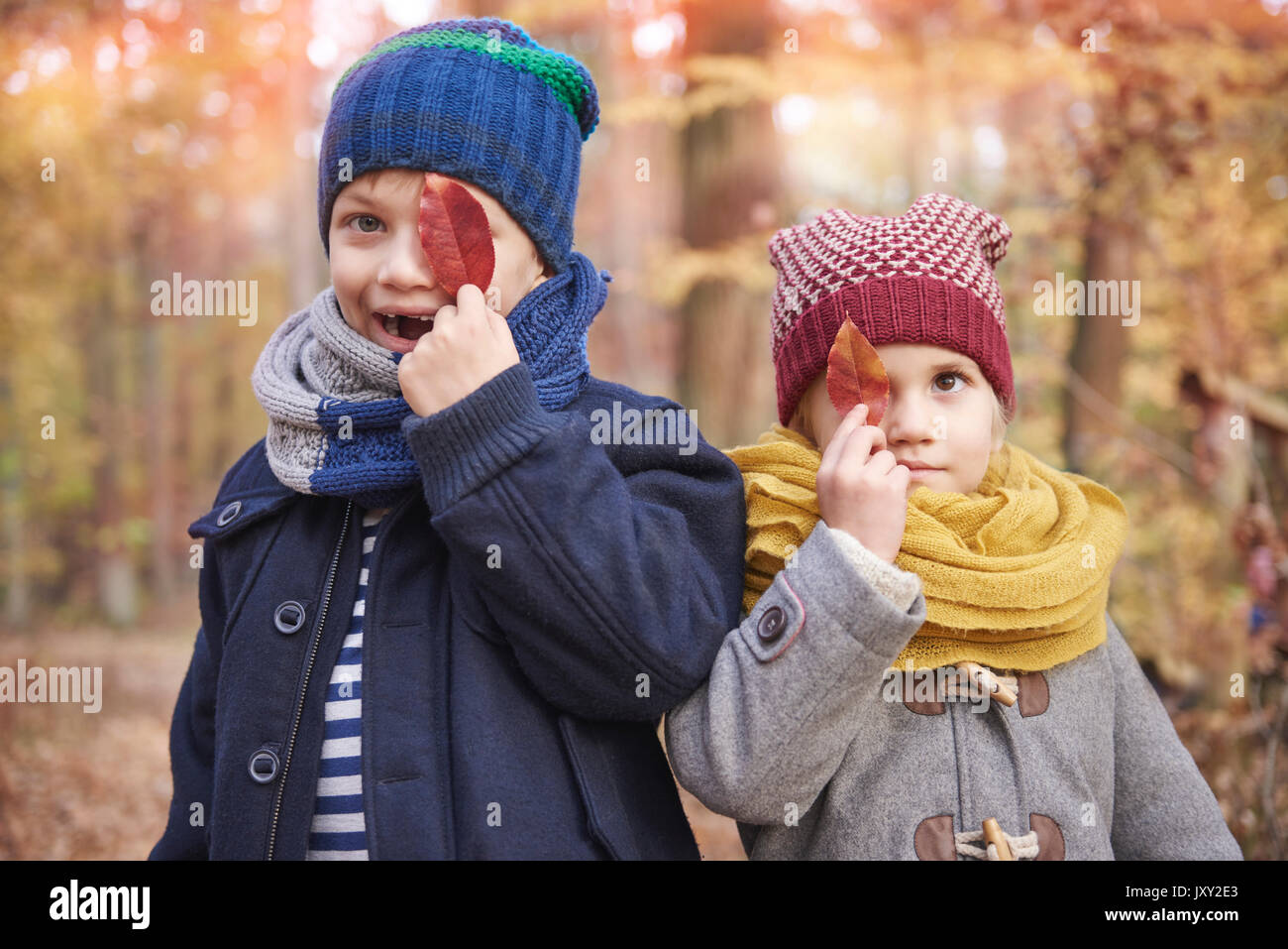 Sweet siblings in the forest Stock Photo - Alamy