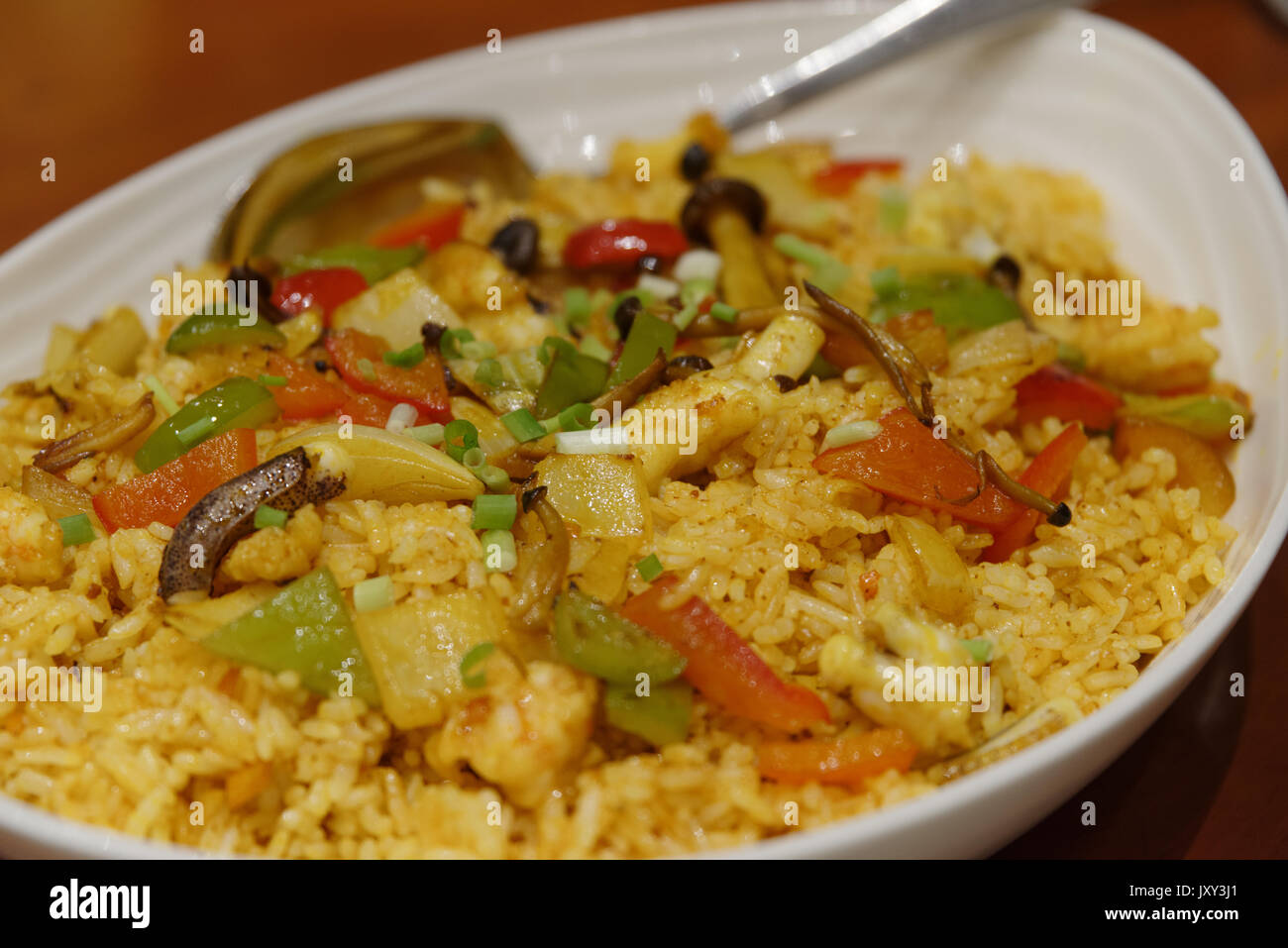 Filipino style java seafood fried rice Stock Photo - Alamy