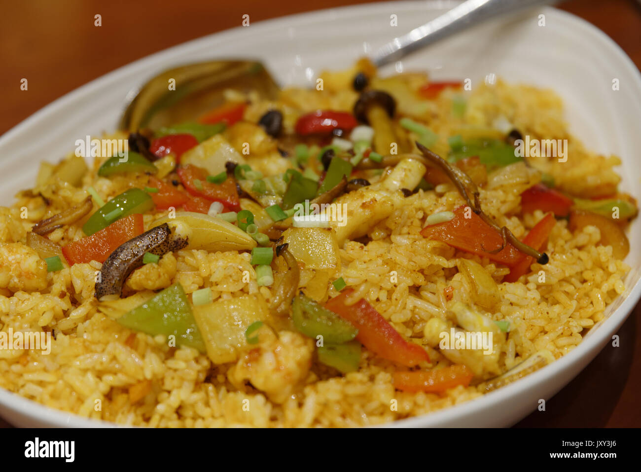 Filipino style java seafood fried rice Stock Photo - Alamy