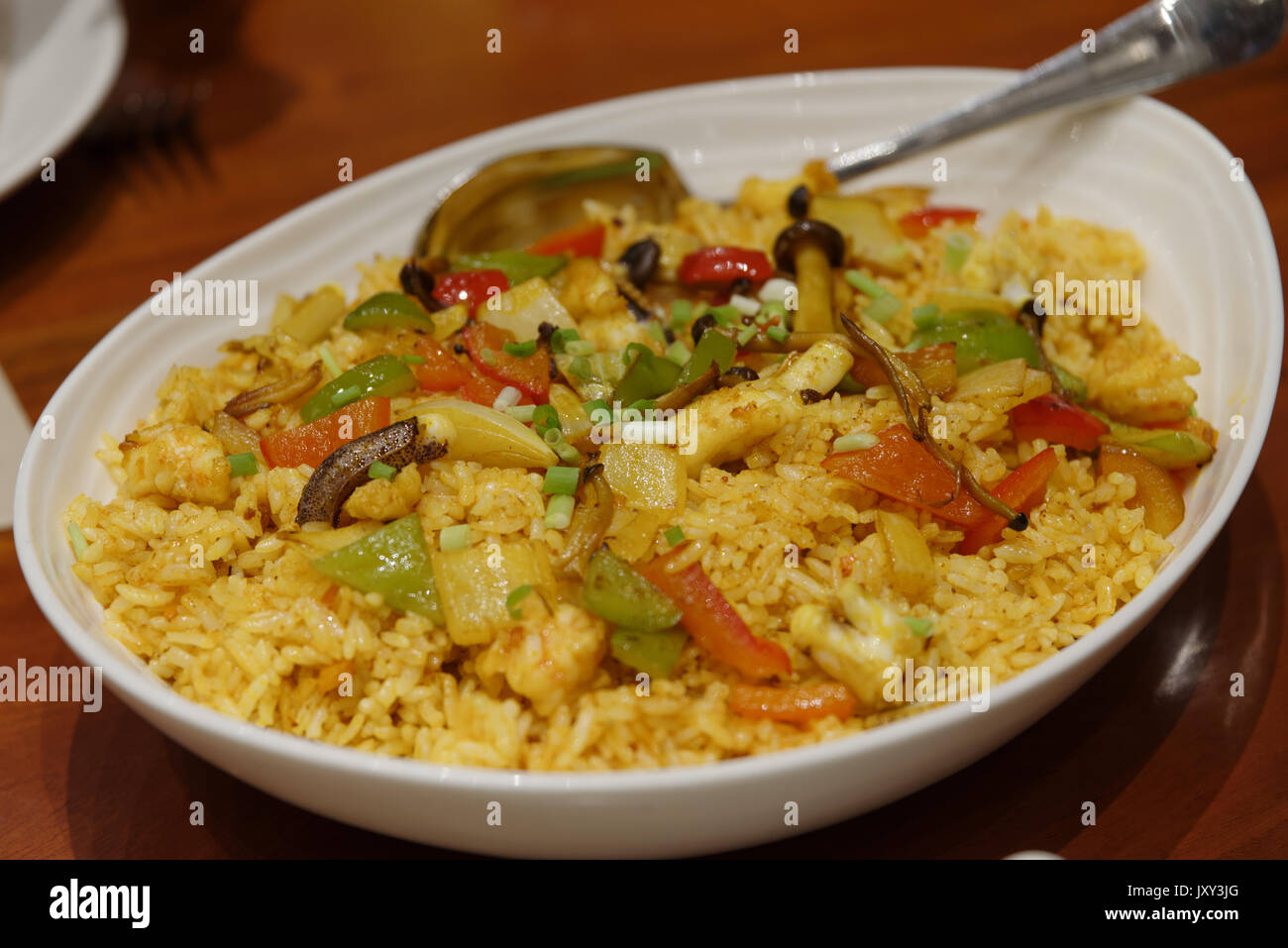 Filipino style java seafood fried rice Stock Photo - Alamy