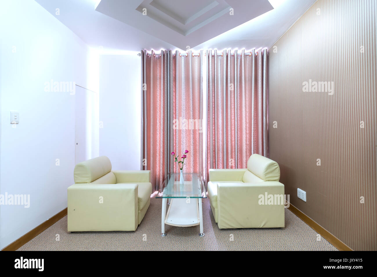Modern living room in luxury apartments with airy, clean amenities ...